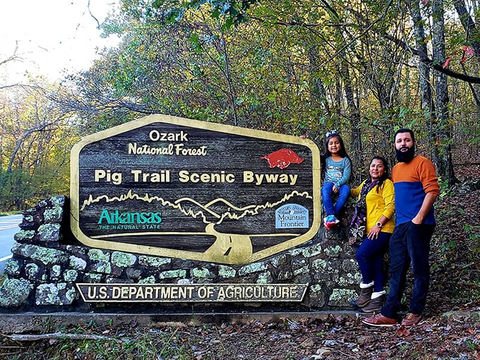 Making memories at the iconic entrance. The perfect photo opportunity that says "Yes, we're sophisticated travelers who also appreciate a good pig pun."
