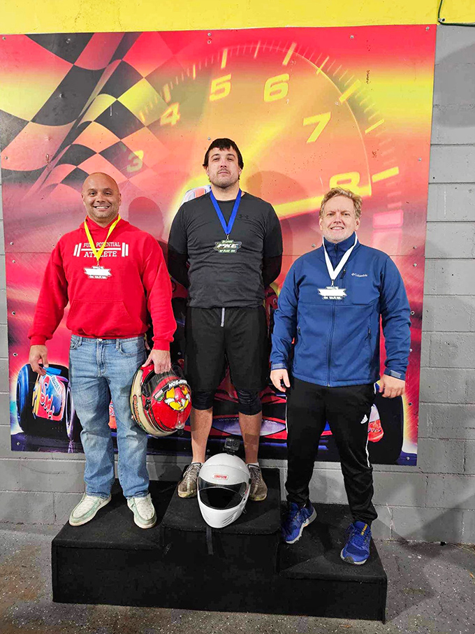 The sweet taste of victory! These podium finishers have earned their medals and the right to embellish their racing stories forever.