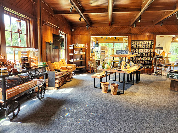 Sunlight streams through windows onto wooden treasures that whisper stories of Kentucky forests and the hands that transformed them.