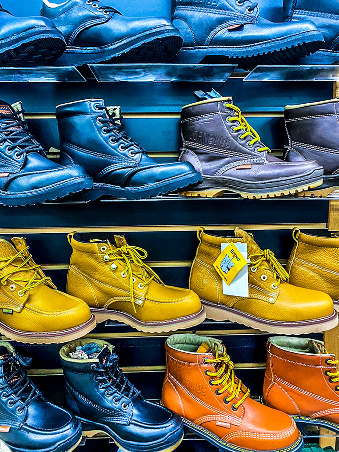 Work boots that mean business next to sunshine-yellow statements for your feet. This wall of footwear tells you to climb higher, walk farther.