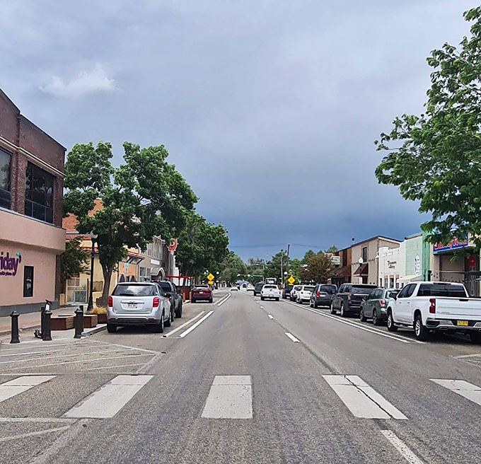 Alamosa's historic corner building anchors a downtown where affordability meets charm. Your Social Security check just sighed with relief.
