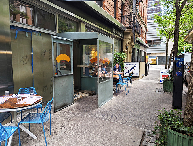 Old John's charming blue entrance booth looks like it could be the setting for the next great New York rom-com meet-cute.