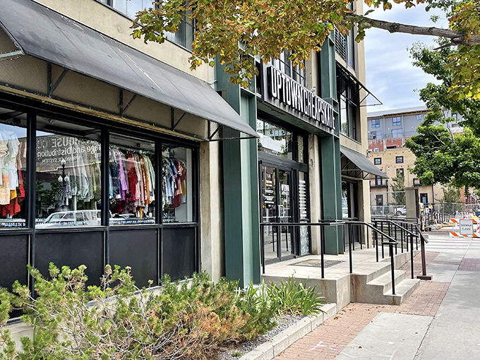 Uptown Cheapskate's industrial-chic exterior brings urban sophistication to the secondhand shopping experience.