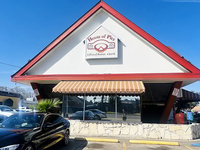 The warm glow from House of Pies at dusk promises 24-hour breakfast possibilities – because morning hunger doesn't follow clocks.