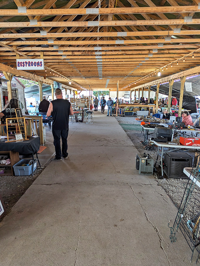 Wooden beams frame the shopping experience at Mio Flea Market. The architecture is as charming as the deals that wait inside!
