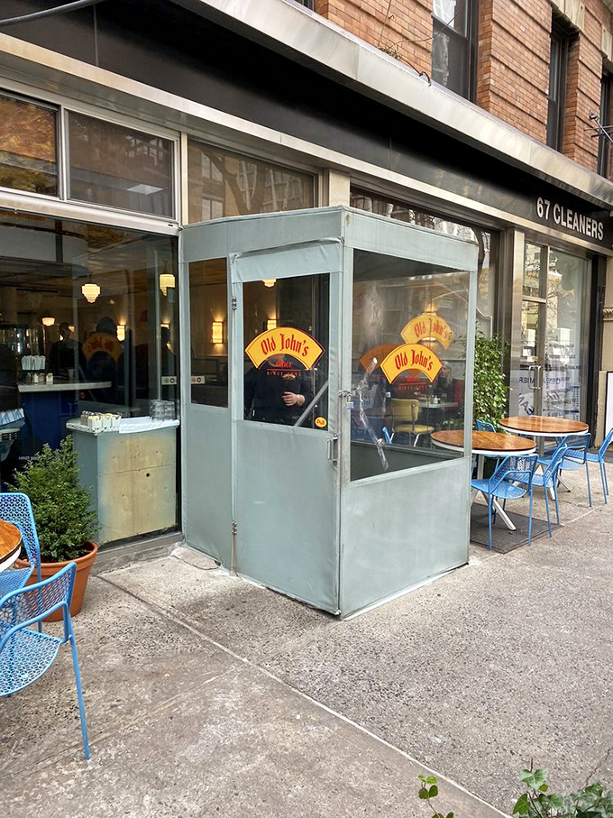 The sidewalk seating at Old John's offers a perfect spot to people-watch while diving into pancakes &ndash; breakfast and a show!