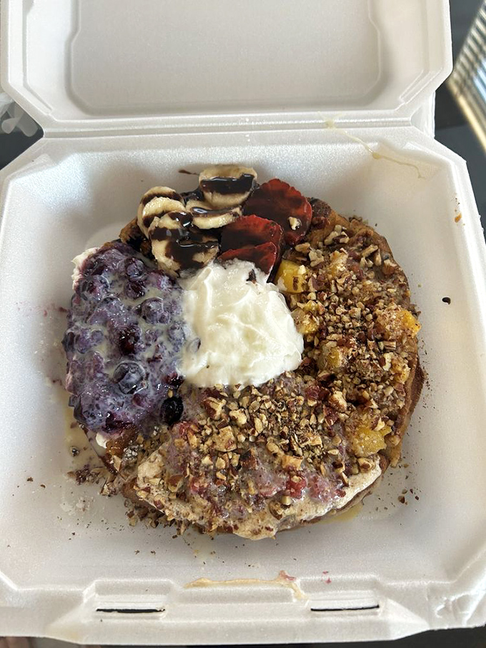 Waffle to-go gets the royal treatment&mdash;not even a takeout container can diminish the glory of those toppings and that blueberry spread.