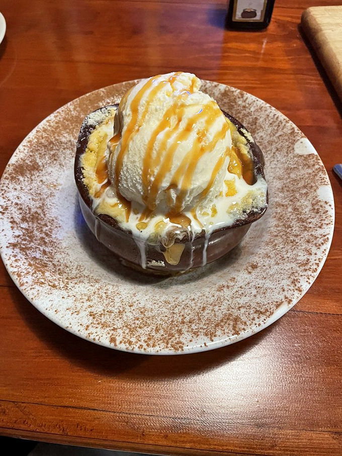 A warm dessert that whispers "there's always room for me." Ice cream melting into warm cobbler creates a sweet symphony of textures.