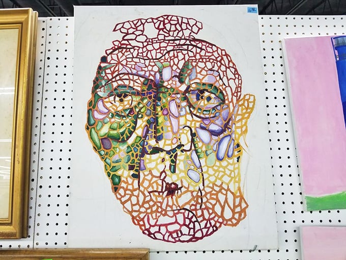 Abstract portrait art that somehow manages to be simultaneously unsettling and captivating&mdash;the kind of find that becomes your home's conversation starter.