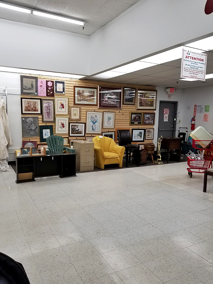 The art wall isn't just decoration&mdash;it's a gallery of possibilities for your blank spaces at home. That yellow armchair? Just waiting for someone's reading nook.