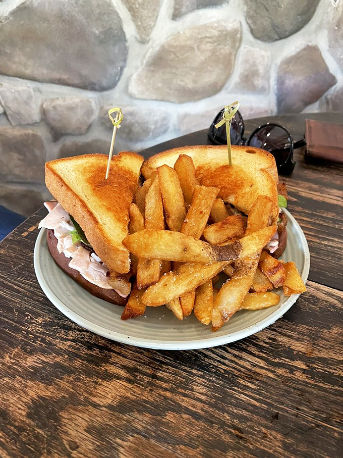 This sandwich isn't messing around—thick-cut toast, generous filling, and chips that look hand-cut by someone who truly cares about potatoes.