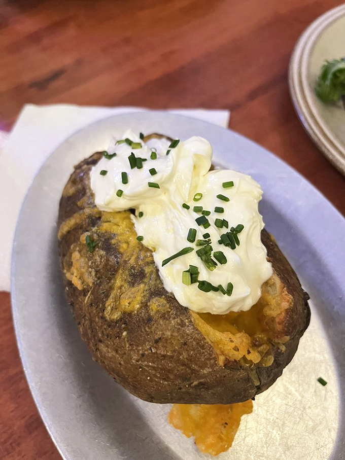A baked potato that's dressed for success. That cloud of sour cream and sprinkle of chives transforms a humble spud into a sophisticated mountain meal.