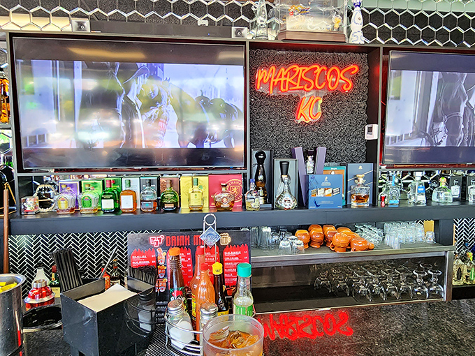 Behind every great seafood joint is a well-stocked bar. That neon sign isn't just decoration&mdash;it's a beacon for flavor seekers.