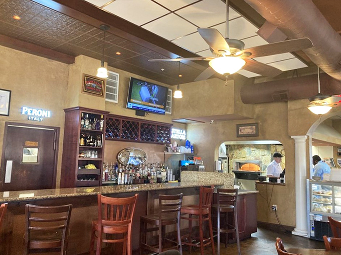 The bar area&mdash;where strangers become friends and friends become family over cold drinks and hot pizza.
