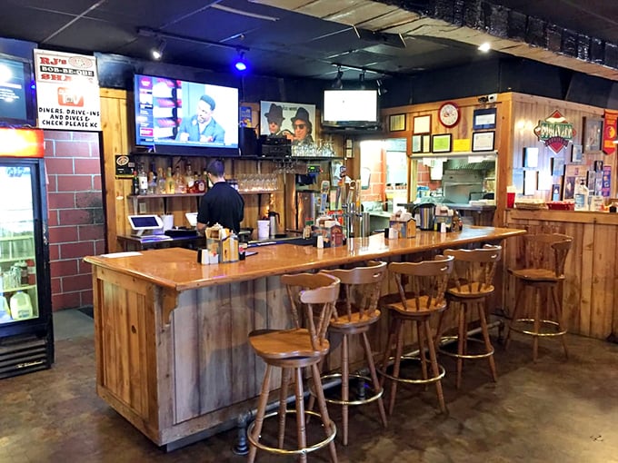 The bar at R.J.'s isn't just serving drinks&mdash;it's hosting a summit where barbecue enthusiasts debate the finer points of smoke rings.