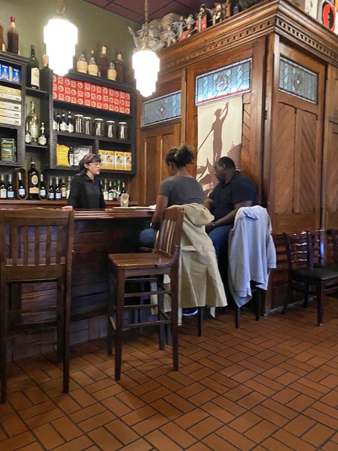 The bar area manages to be both sophisticated and welcoming, like that cool uncle who taught you to play poker but still gives great advice.