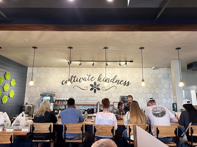 Cultivate kindness isn't just wall art&mdash;it's the philosophy that seasons everything at HomeGrown. The honeycomb tile backdrop is just showing off.