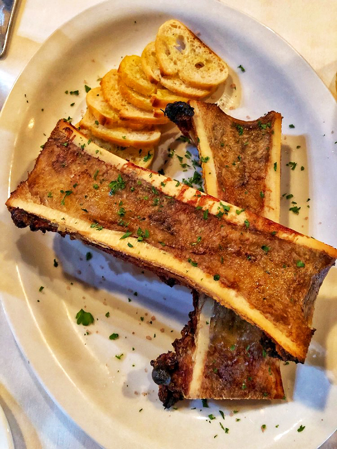Bone marrow: nature's butter, served with the kind of bread that exists solely to transport this prehistoric delicacy from plate to palate.