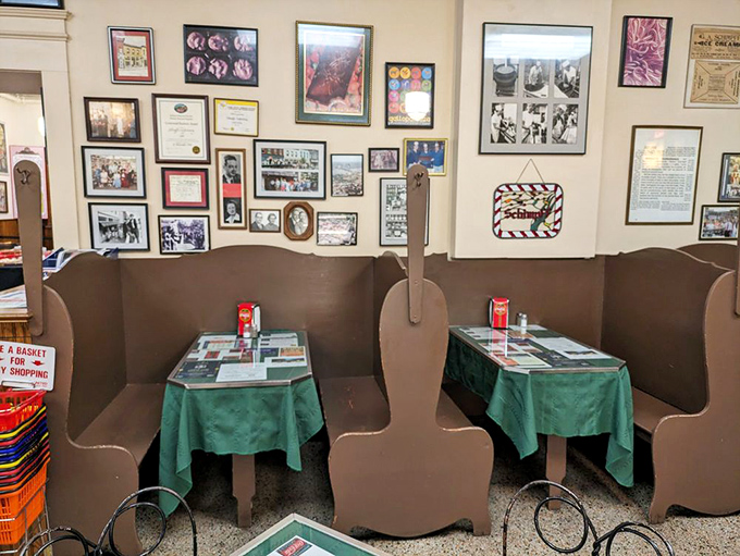 These violin-backed booths aren't just quirky—they're front-row seats to a sugar show that's been running continuously since the horse-and-buggy era.