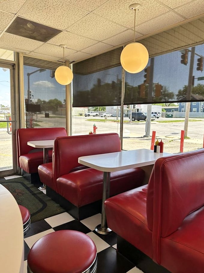 These booths have heard more stories than a bartender, their red vinyl a welcome embrace for weary travelers and hungry locals alike.