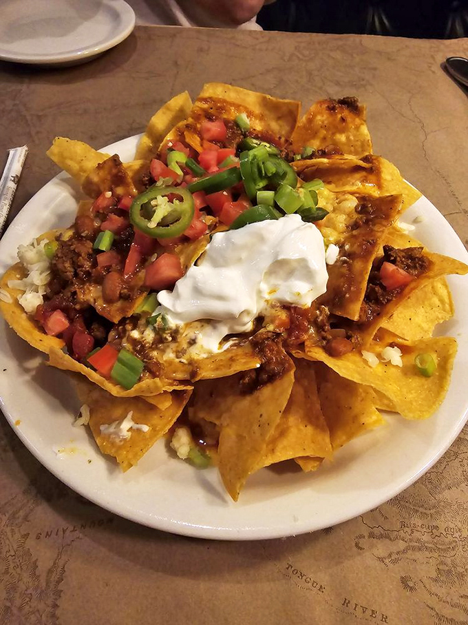 Nachos that require a topographical map to navigate&mdash;layers of cheese, meat, and toppings creating a delicious landscape of Tex-Mex perfection.