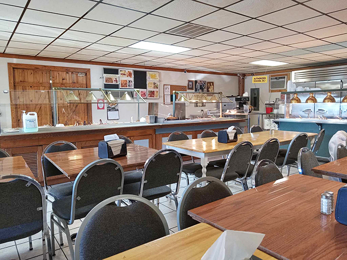 The dining room's wood-paneled charm transports you to a simpler time, when calories weren't counted and second helpings were expected, not excused.