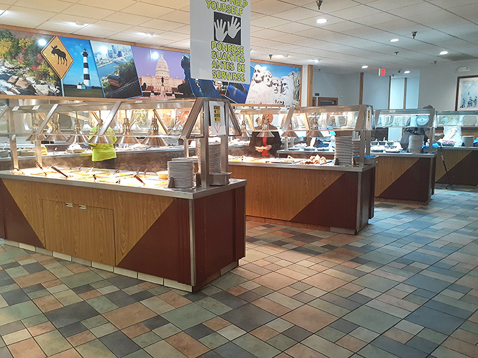 The buffet stations stand at attention like culinary soldiers, ready to serve. The American dream, steam-table style.