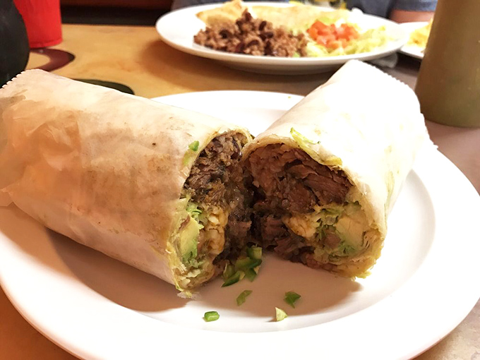 Cut into this burrito and witness the miracle of perfect distribution &ndash; every bite delivers the ideal ratio of fillings in its warm tortilla embrace.