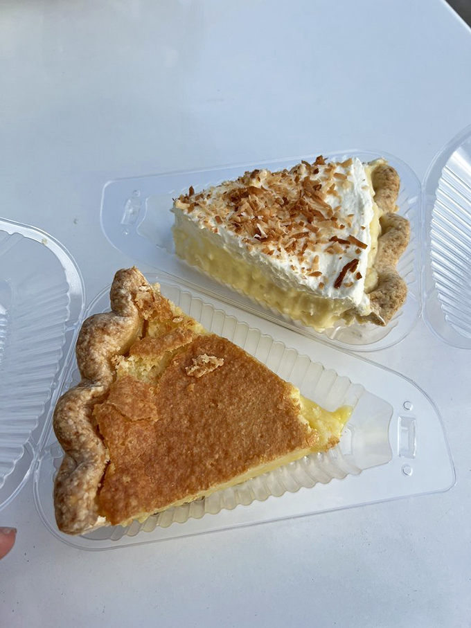 The yin and yang of pie perfection. Custard meets coconut in a display case showdown where everyone wins.