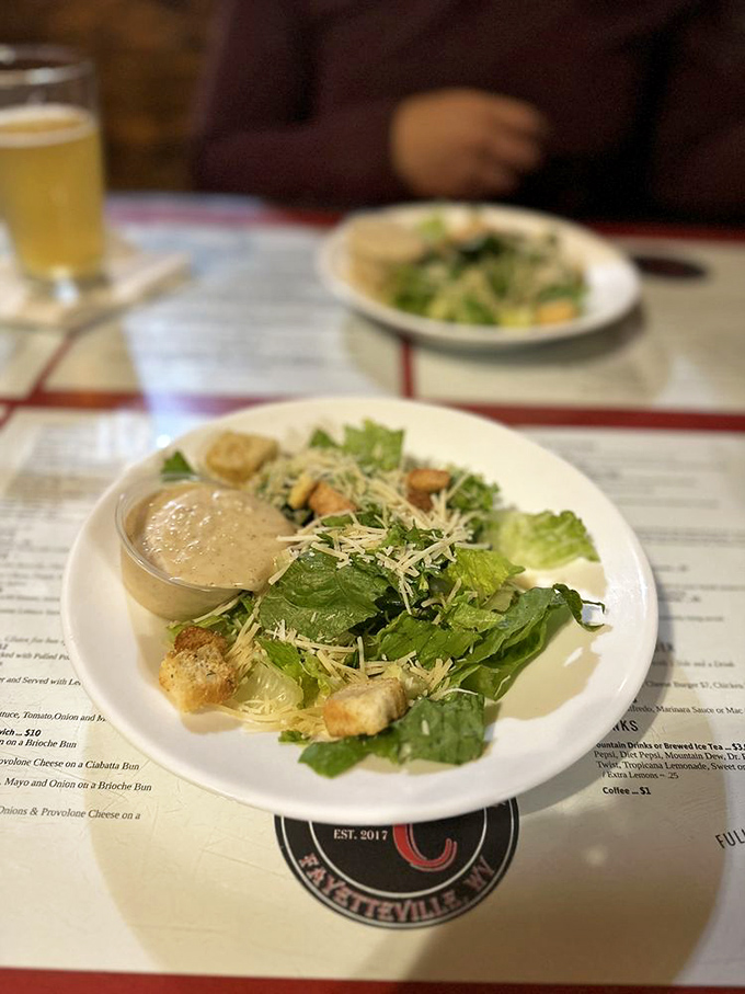 Even the salads here mean business. Crisp romaine, freshly shaved parmesan, and house-made croutons prove green can be glorious too.