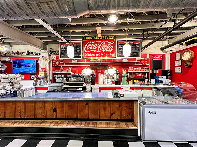 This isn't just a soda counter&mdash;it's a portal to 1950s America. The Coca-Cola shrine gleams with nostalgia and promises of ice-cold refreshment.