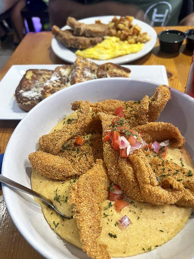 Catfish and grits&mdash;a Southern classic elevated to art form. The cornmeal crust shatters with each bite into perfectly tender fish.