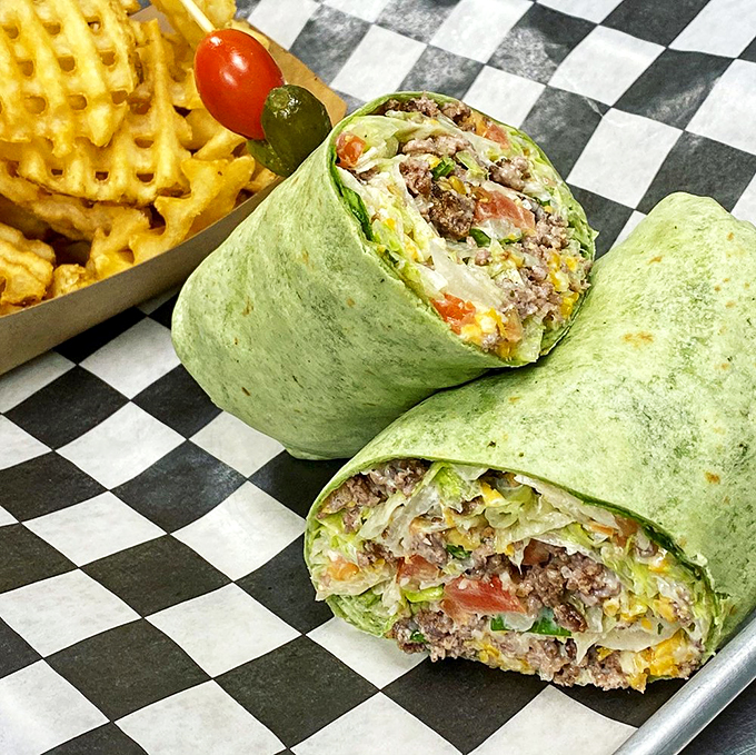 Wings that glisten with sweet heat sauce—crispy, sticky, messy perfection that justifies every napkin you'll need afterward.