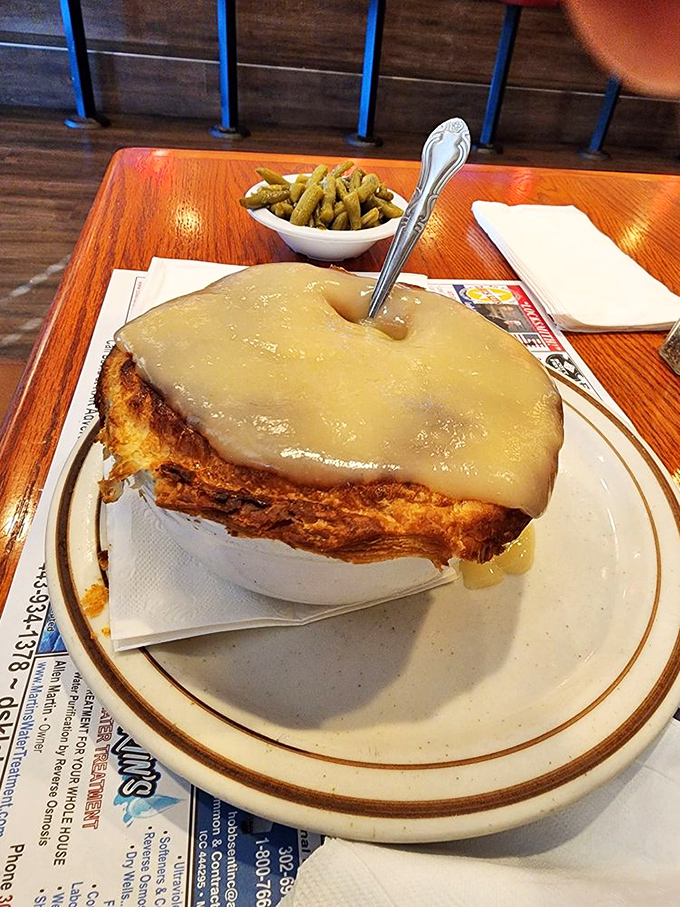 Chicken pot pie with a golden crown of pastry that's practically royalty. The steam escaping when you break through? Pure kitchen theater.