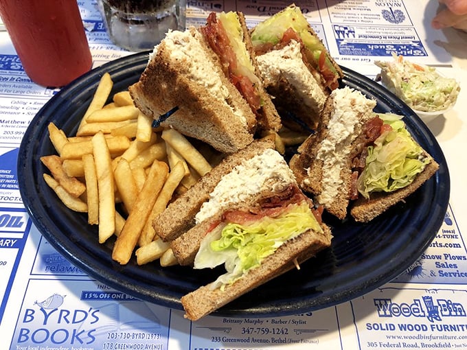 The club sandwich&mdash;cut into four perfect triangles because some traditions, like geometric sandwich satisfaction, should never change.