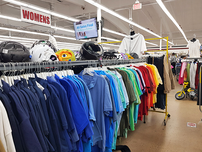 Color-coded clothing racks bring order to the treasure hunt&mdash;like a rainbow organized by size rather than spectrum.