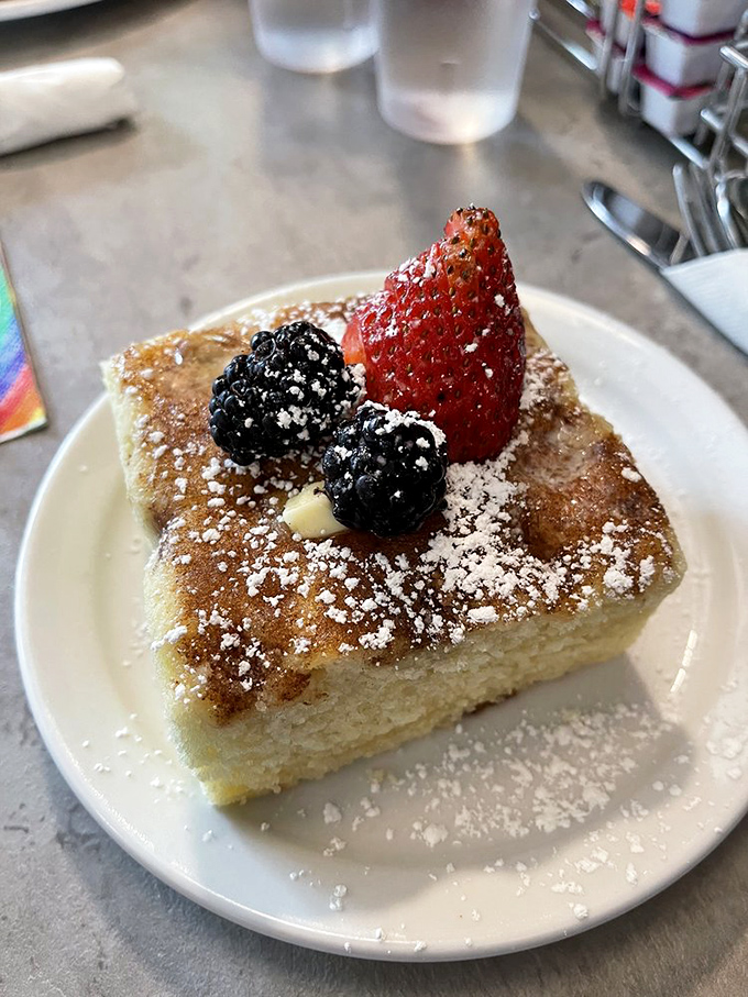 Coffee cake that looks like it could win a baking competition. Those berries aren't just garnish&mdash;they're little jewels crowning a breakfast treasure.