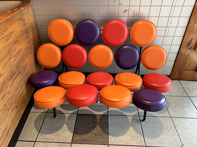 The colorful counter seats look like a mod art installation but serve a higher purpose&mdash;getting you closer to the action and the coffee pot.