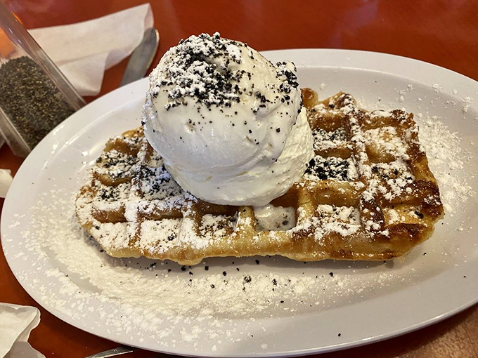 A waffle topped with ice cream and cookie crumbles&mdash;dessert masquerading as breakfast, and nobody's complaining about the disguise.