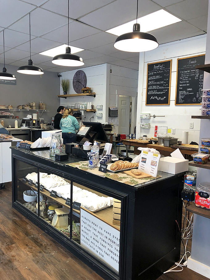 Behind this counter, magic happens daily. The display case is basically a museum of carbohydrate masterpieces.