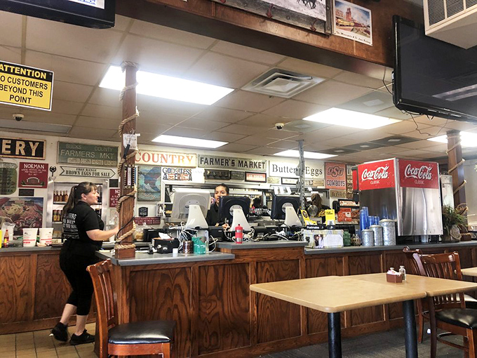 The heart of operations&mdash;Jimmy's counter where orders are called, coffee is poured, and regulars exchange friendly banter with staff who know them by name.