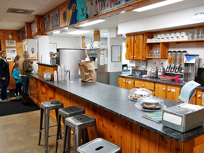 Behind this counter, dairy alchemy transforms cream into gold. The crowd watches with reverence, knowing greatness is about to happen.
