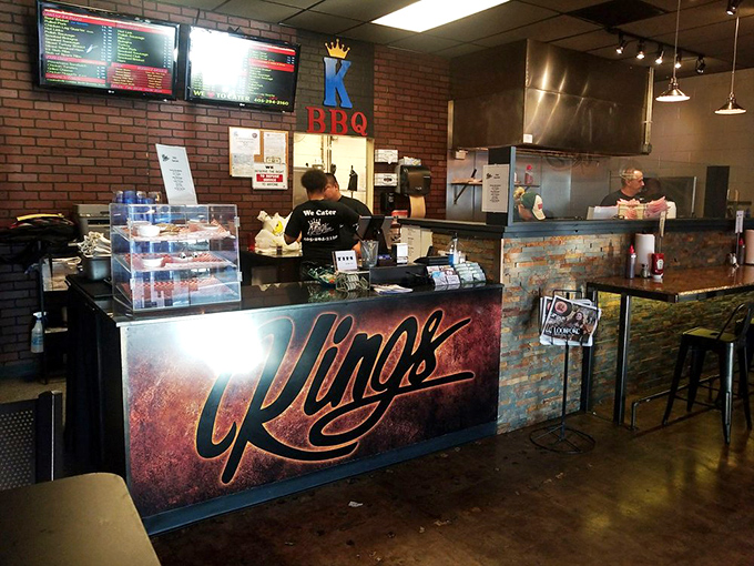 The counter where barbecue dreams come true. That display case holds smoked treasures that people drive hours to experience.