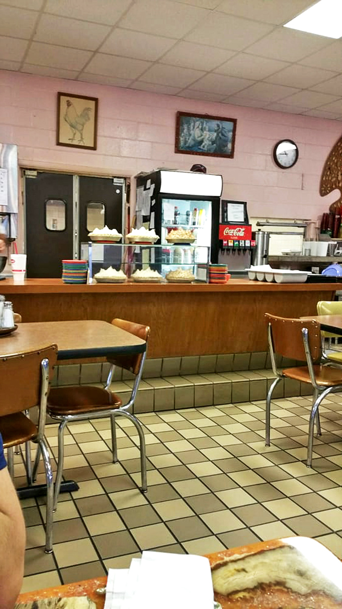 The counter view &ndash; where pies wait patiently in their display case, tempting you to save room for dessert before you've even ordered.