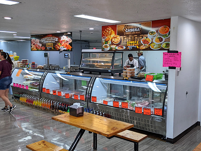 Behind this counter, culinary wizards transform simple ingredients into complex flavor symphonies that would make even the most jaded foodie weep with joy. 