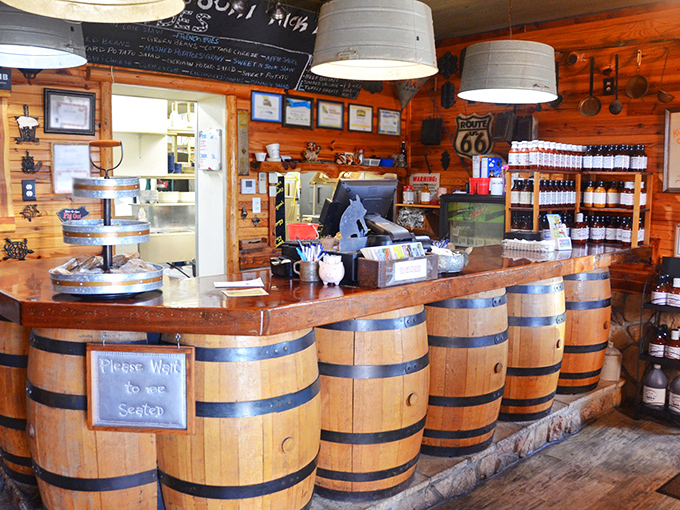 Barrel-front counter service with Route 66 memorabilia—because great barbecue deserves a great introduction before it reaches your table.