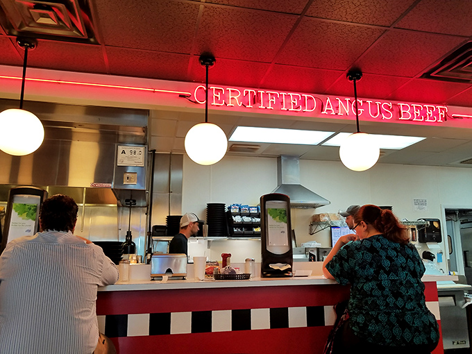 "Certified Angus Beef" glows in neon above the counter&mdash;not just words, but a promise delivered on every plate.