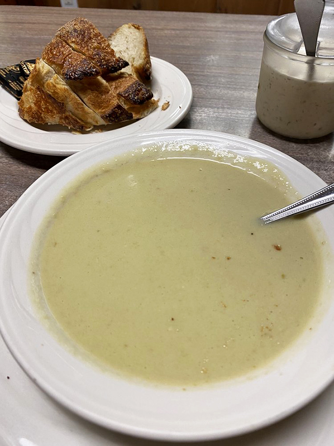 A hearty bowl of chowder accompanied by crusty bread&mdash;comfort in its most perfect form, like a warm hug from a grandmother who really knows her way around a kitchen. 