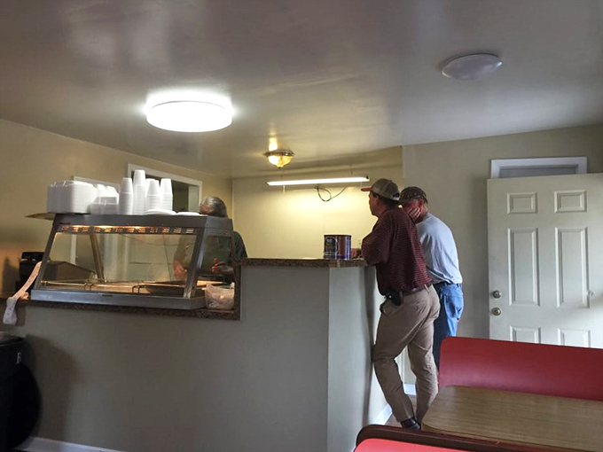 The ordering counter&mdash;where dreams are placed and fulfilled. Notice the anticipation in their posture? That's tamale excitement.