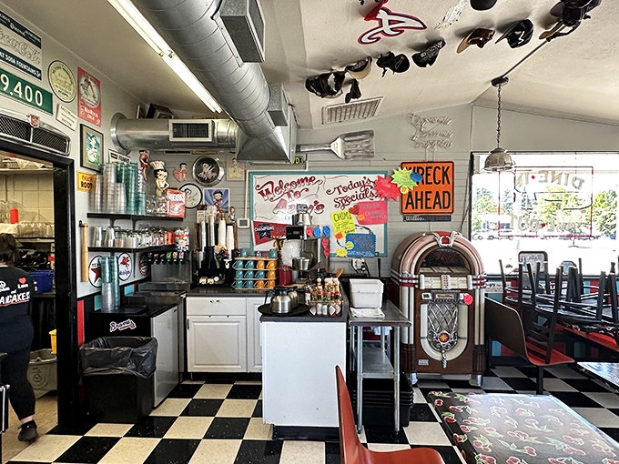 The license plate collection isn't decoration&mdash;it's a road trip history museum where every state tells a story. The ultimate "I was here" gallery. 